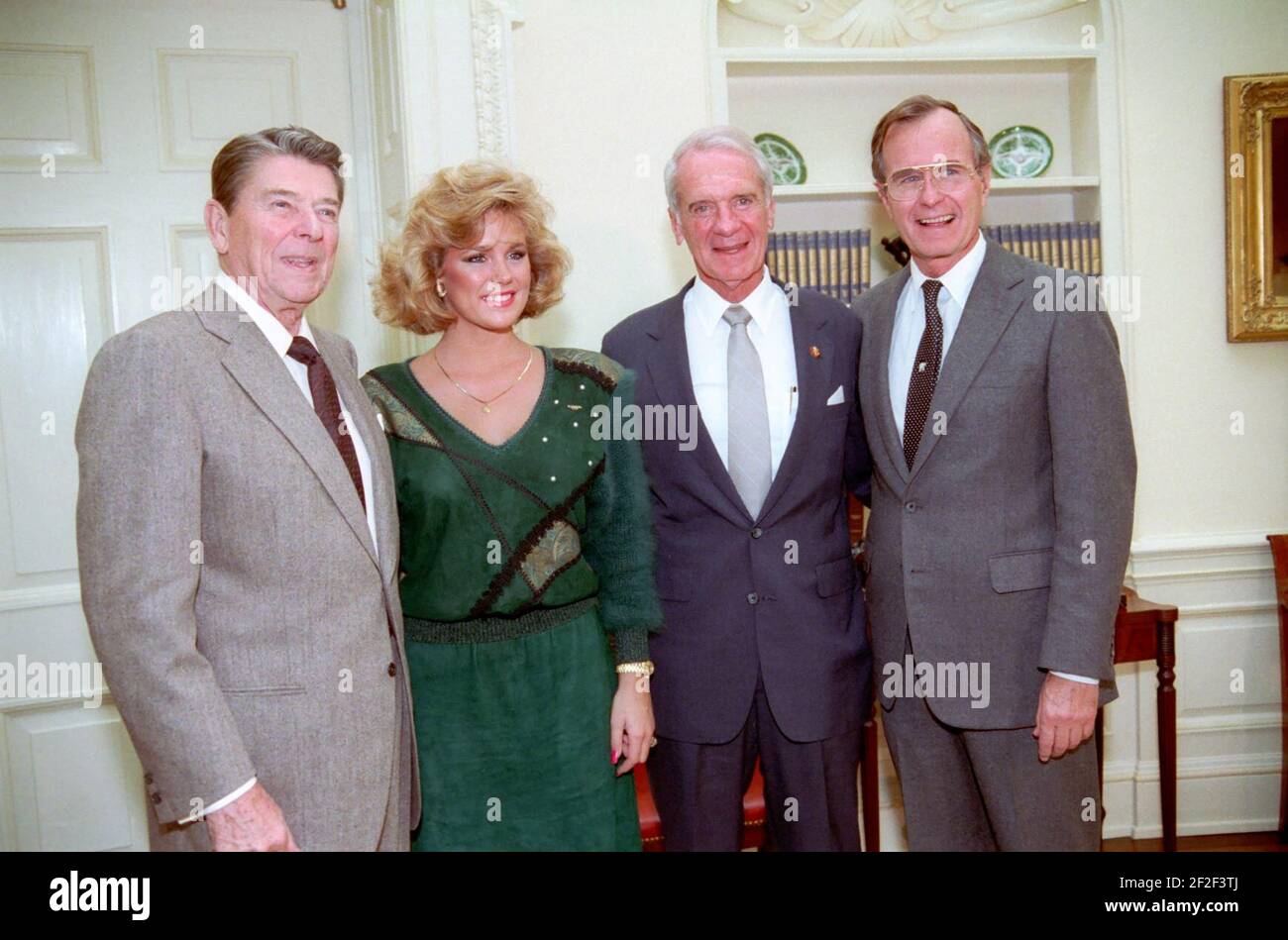 President Ronald Reagan with Susan Akin, Sonny Montgomery, and George H ...