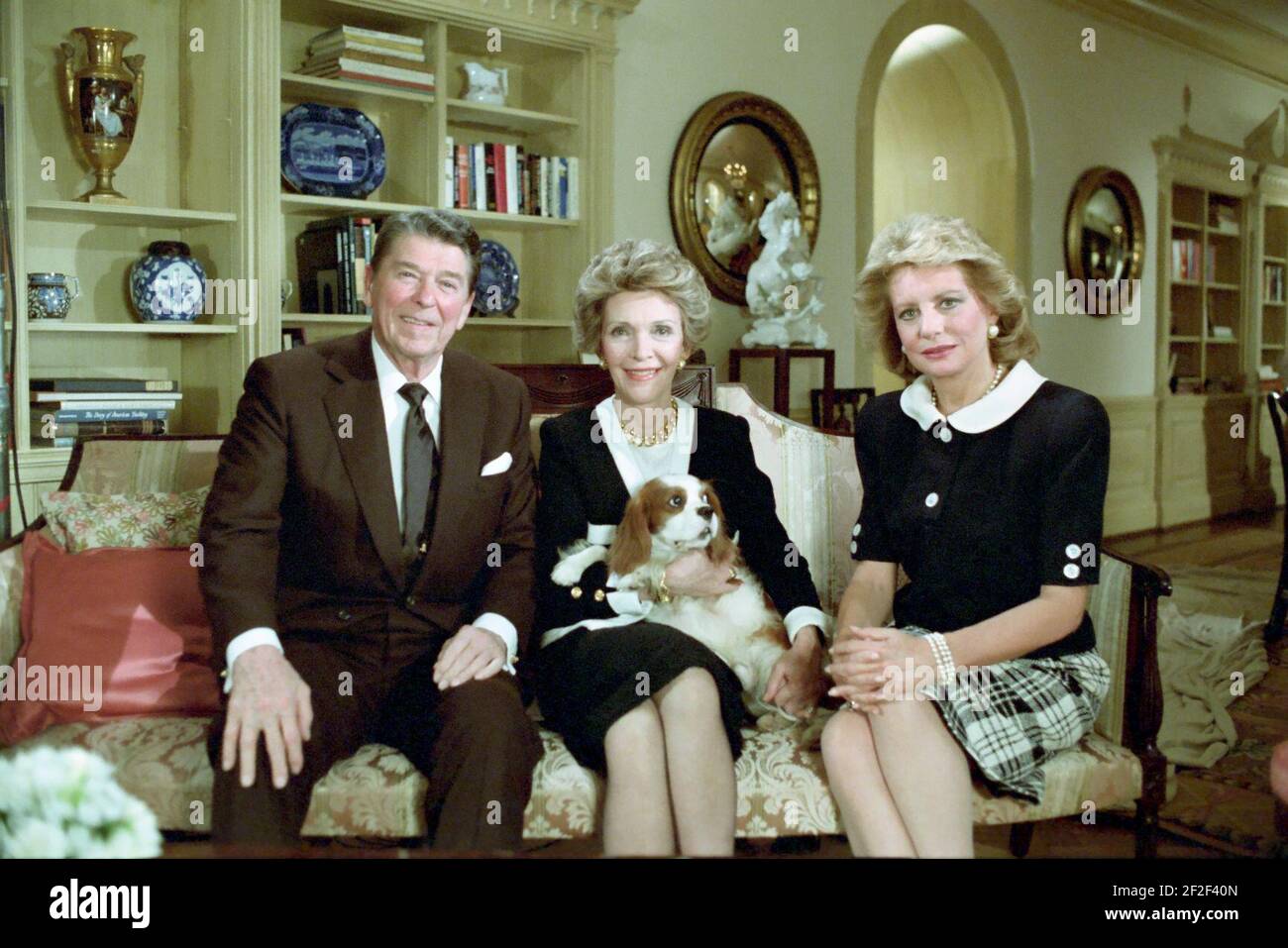 President Ronald Reagan, Nancy Reagan, and Rex in the residence during ...