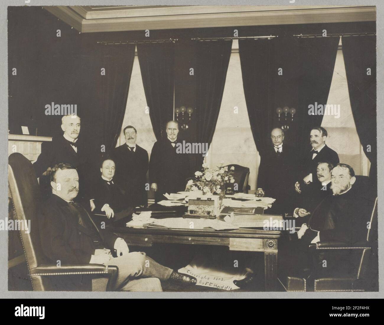 President Theodore Roosevelt with members of his cabinet seated and ...