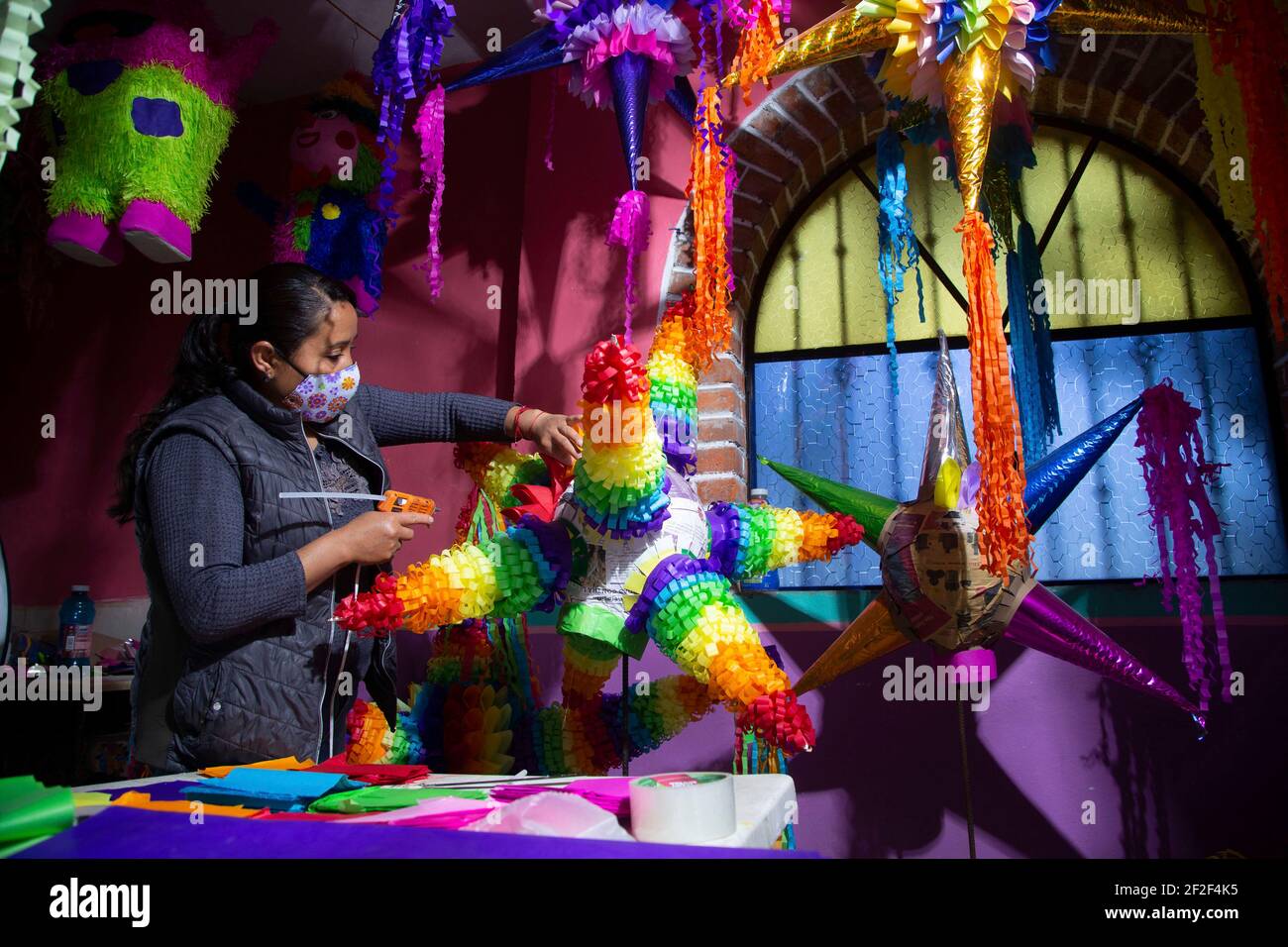 ACOLMAN, MEXICO - MARCH 7, 2021: A woman manufactures the traditional ...
