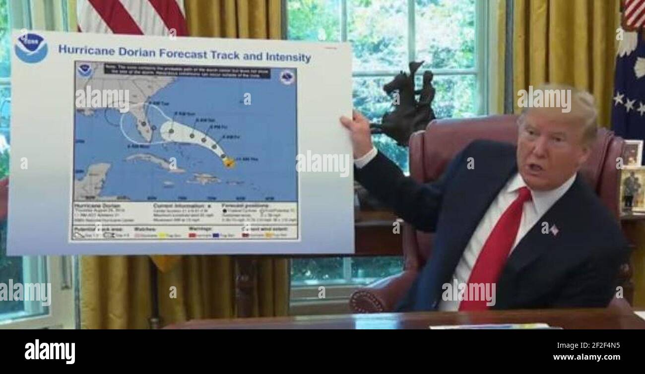 President Trump holding an altered hurricane forecast map Stock Photo ...