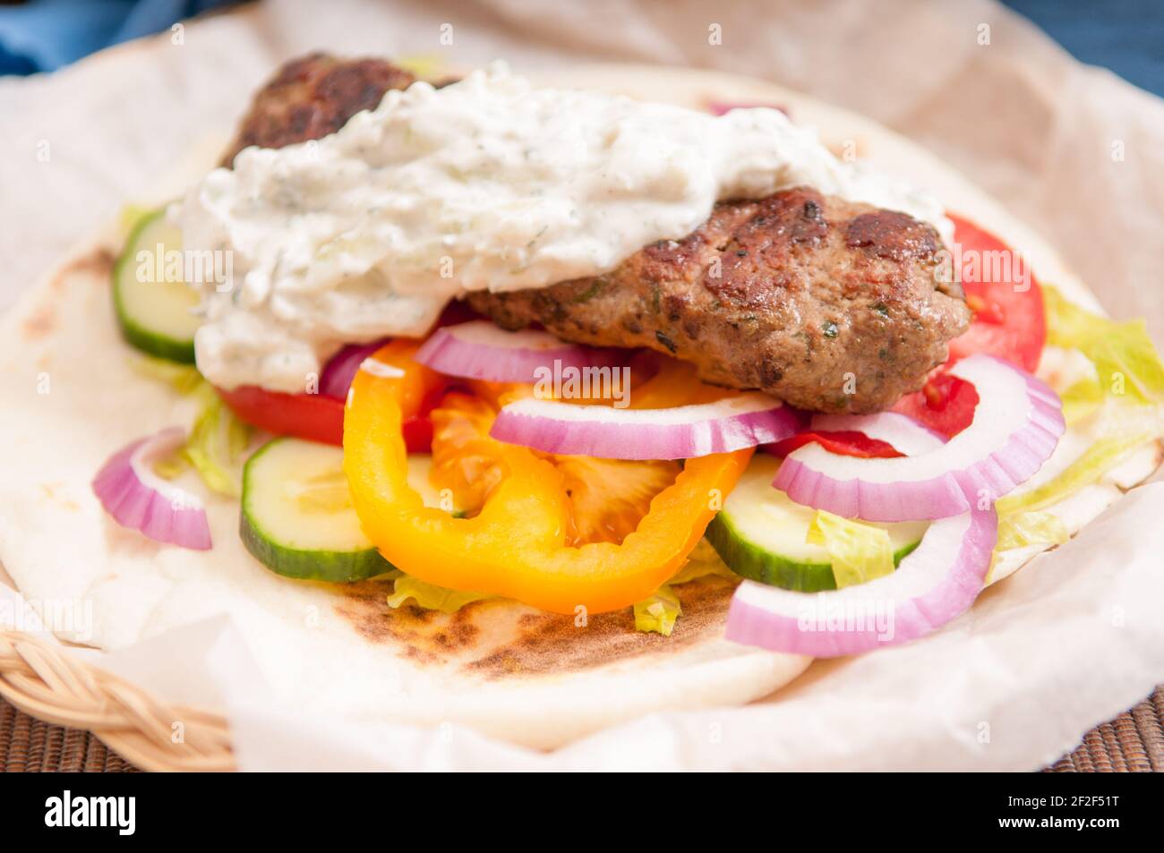delicious flatbread wrap koobideh, iranian skewer with fresh vegetables ...