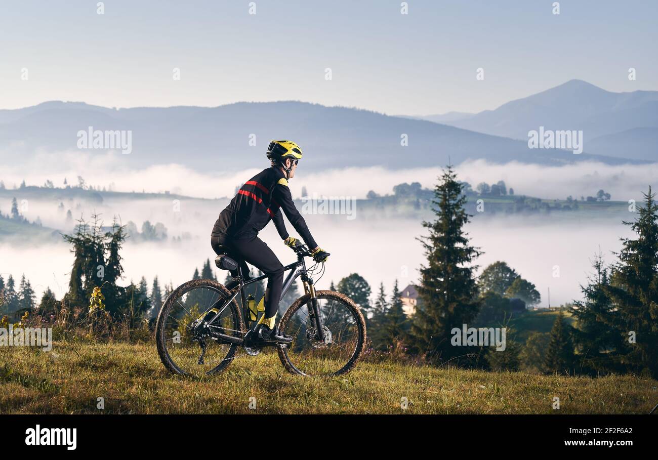 Male cyclist riding bicycle hi-res stock photography and images - Alamy