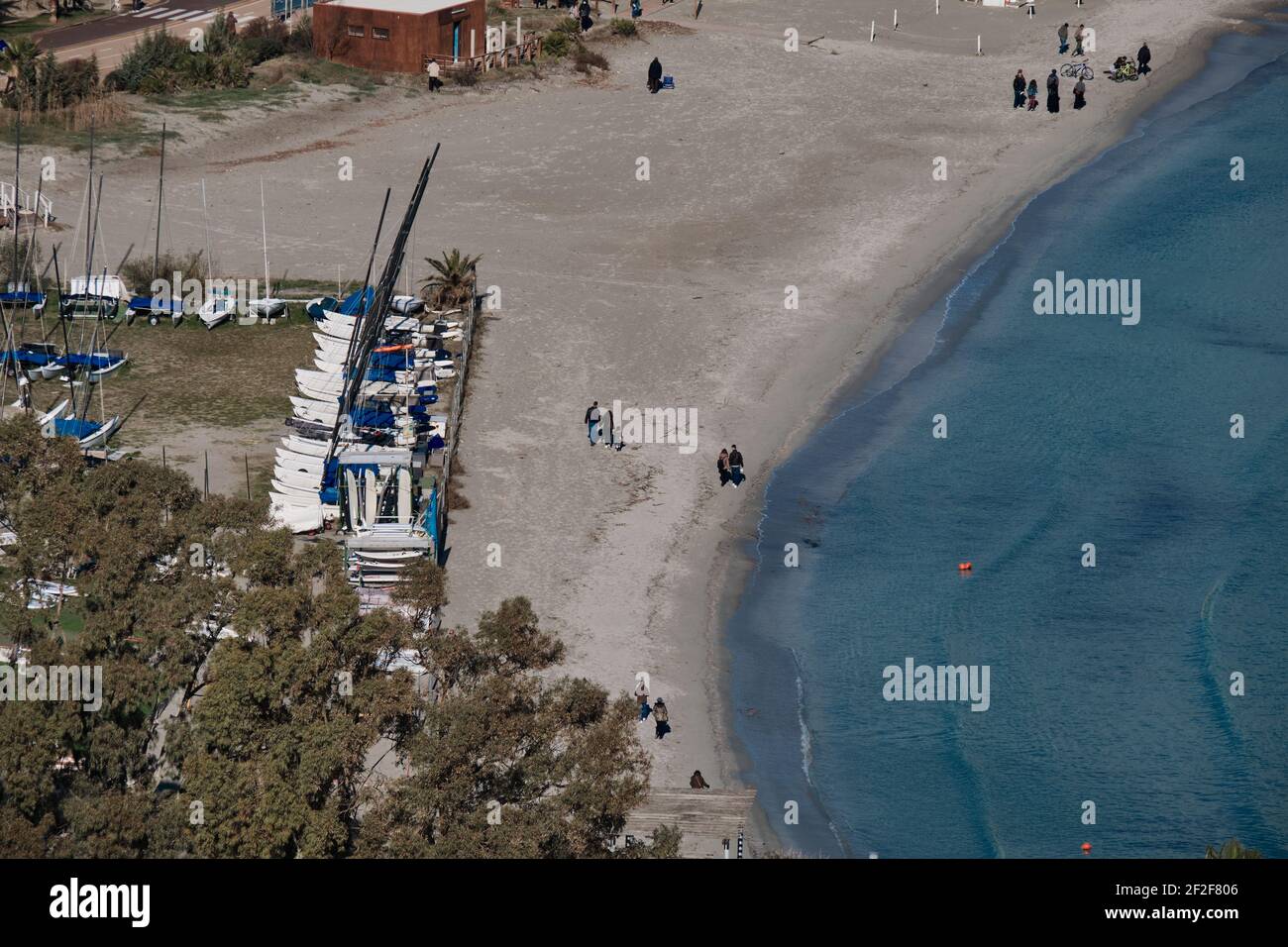 aerial view of the shoreline of poetto beach with buildings - Cagliari ...