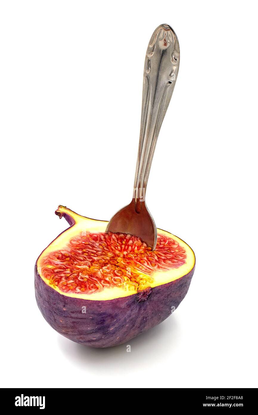 Figs slice isolated on white background with shadow. A half figs with a ...
