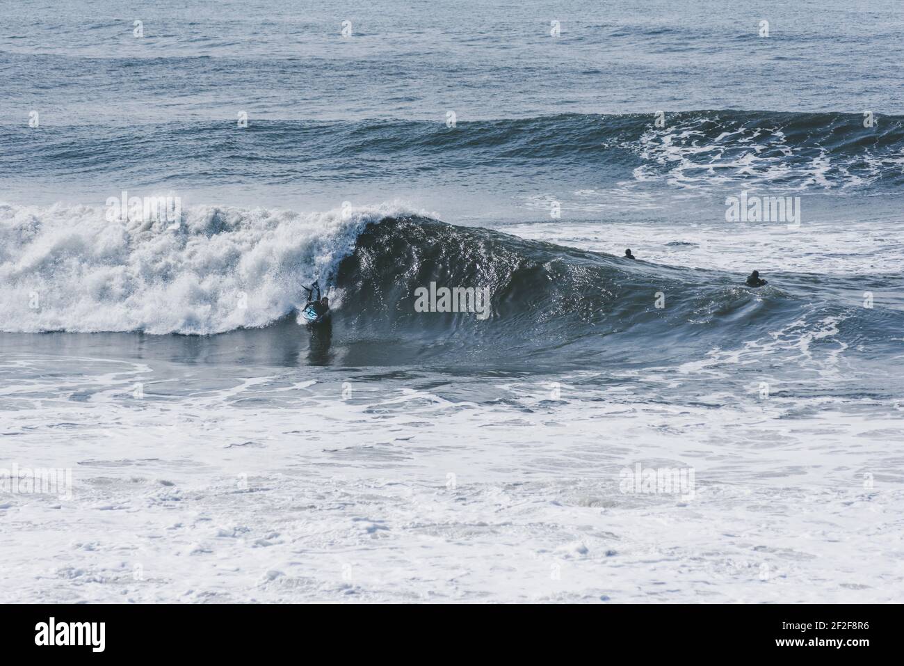 NAZARé, PORTUGAL - Feb 02, 2021: An amazing shot of big waves crashing ...
