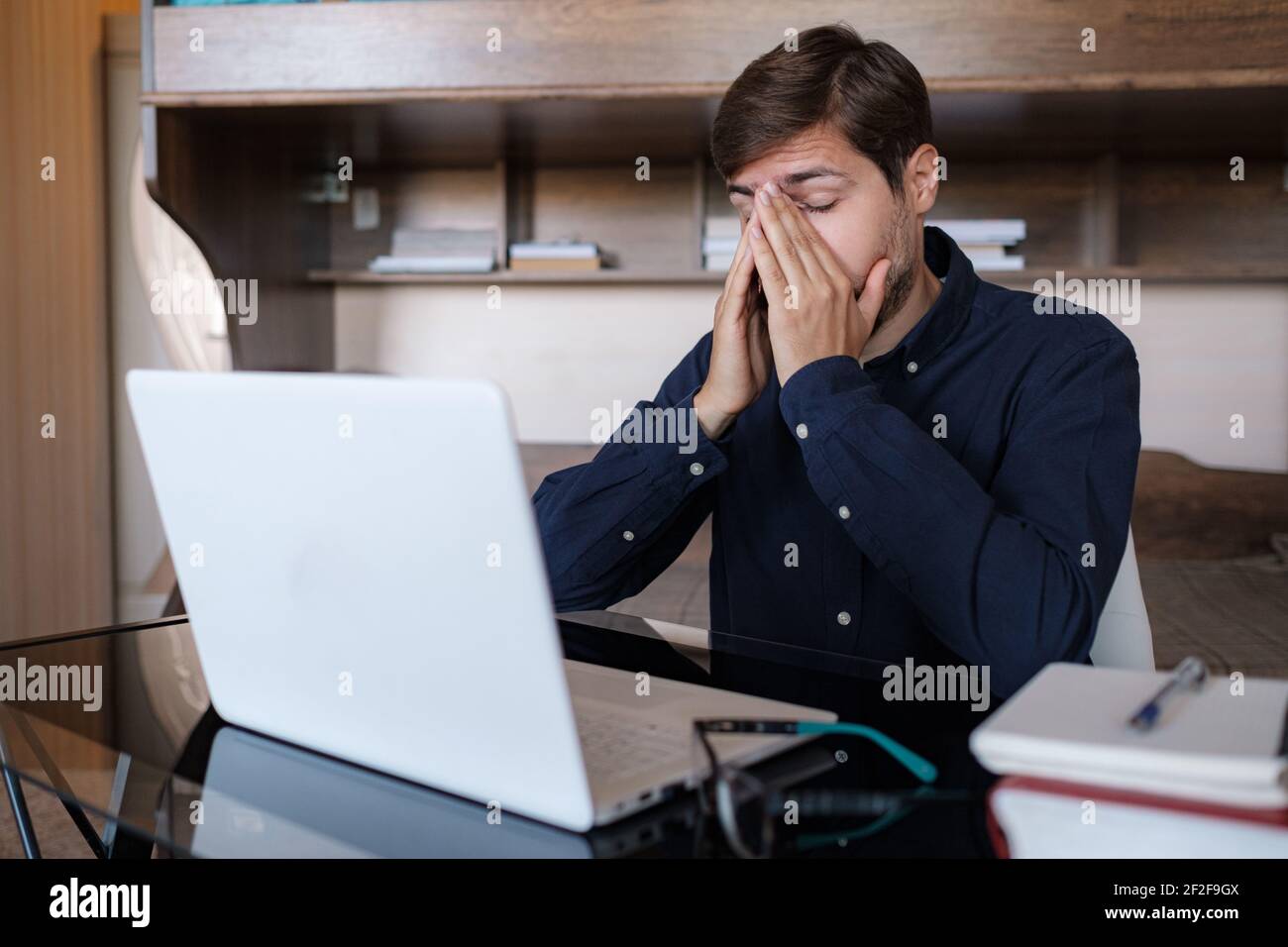 Stressed unhealthy businessman tired, overworked young man wearing ...
