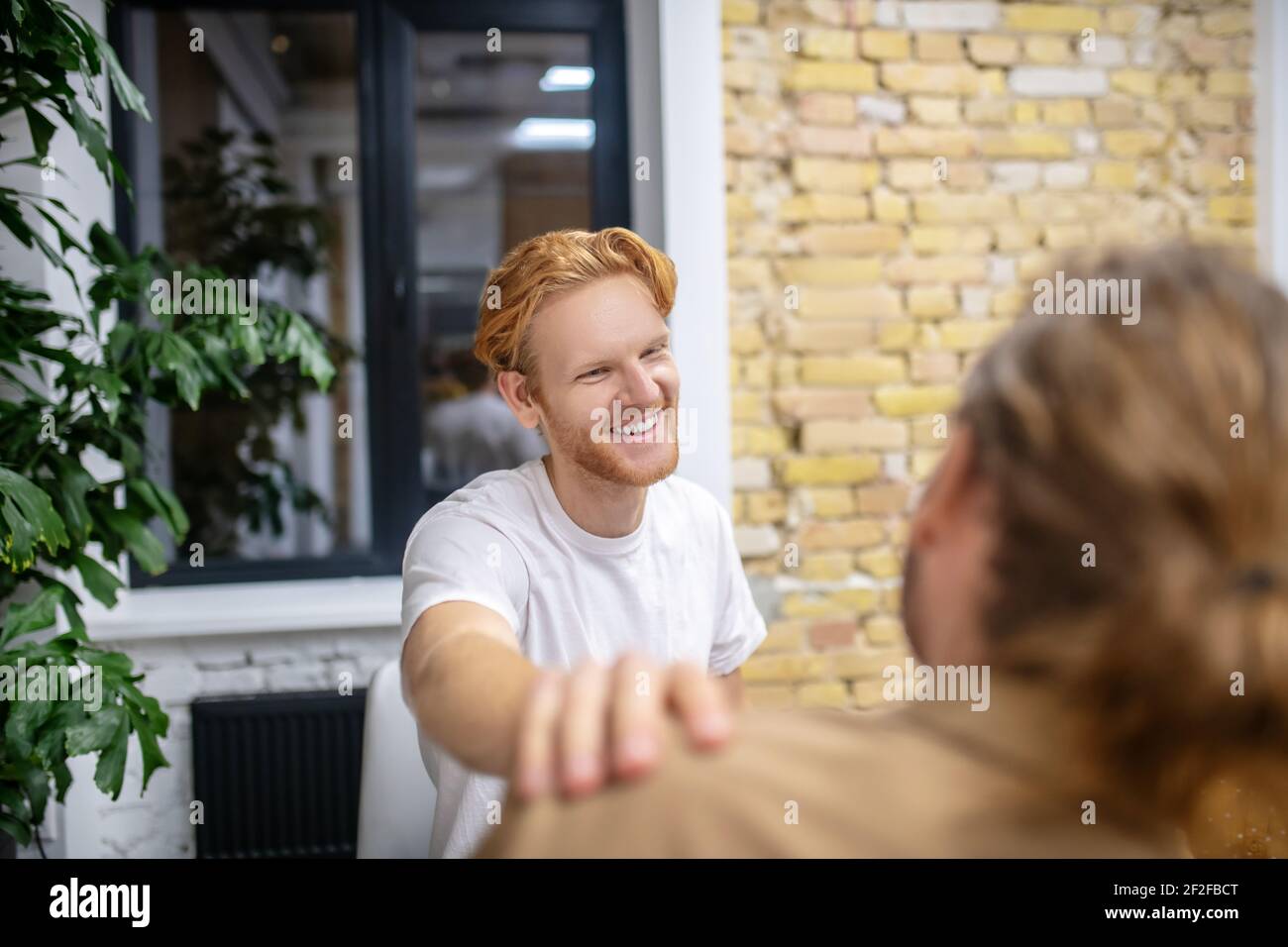 Supporting each other hi-res stock photography and images - Alamy