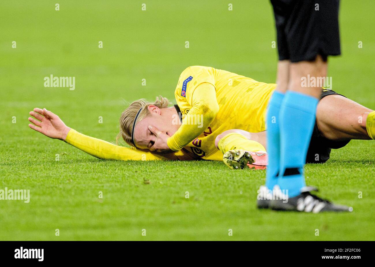 Erling HAALAND (DO) lies on the ground and holds his face, Football ...