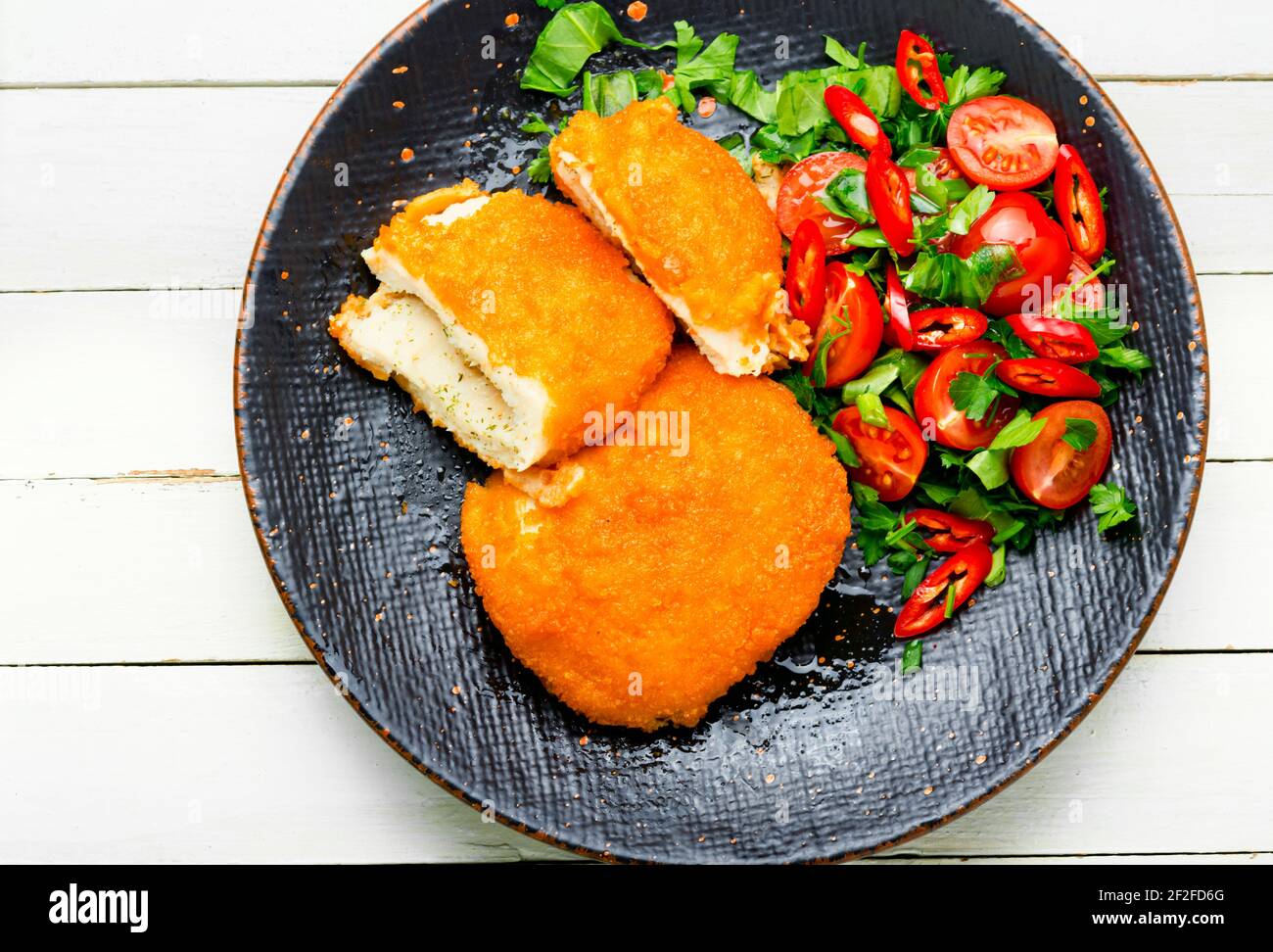 Kiev cutlet with fresh vegetable salad.Chicken meatballs Stock Photo ...