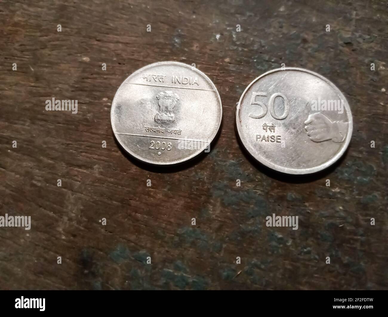 Indian Old 50 paise coins silver Stock Photo - Alamy