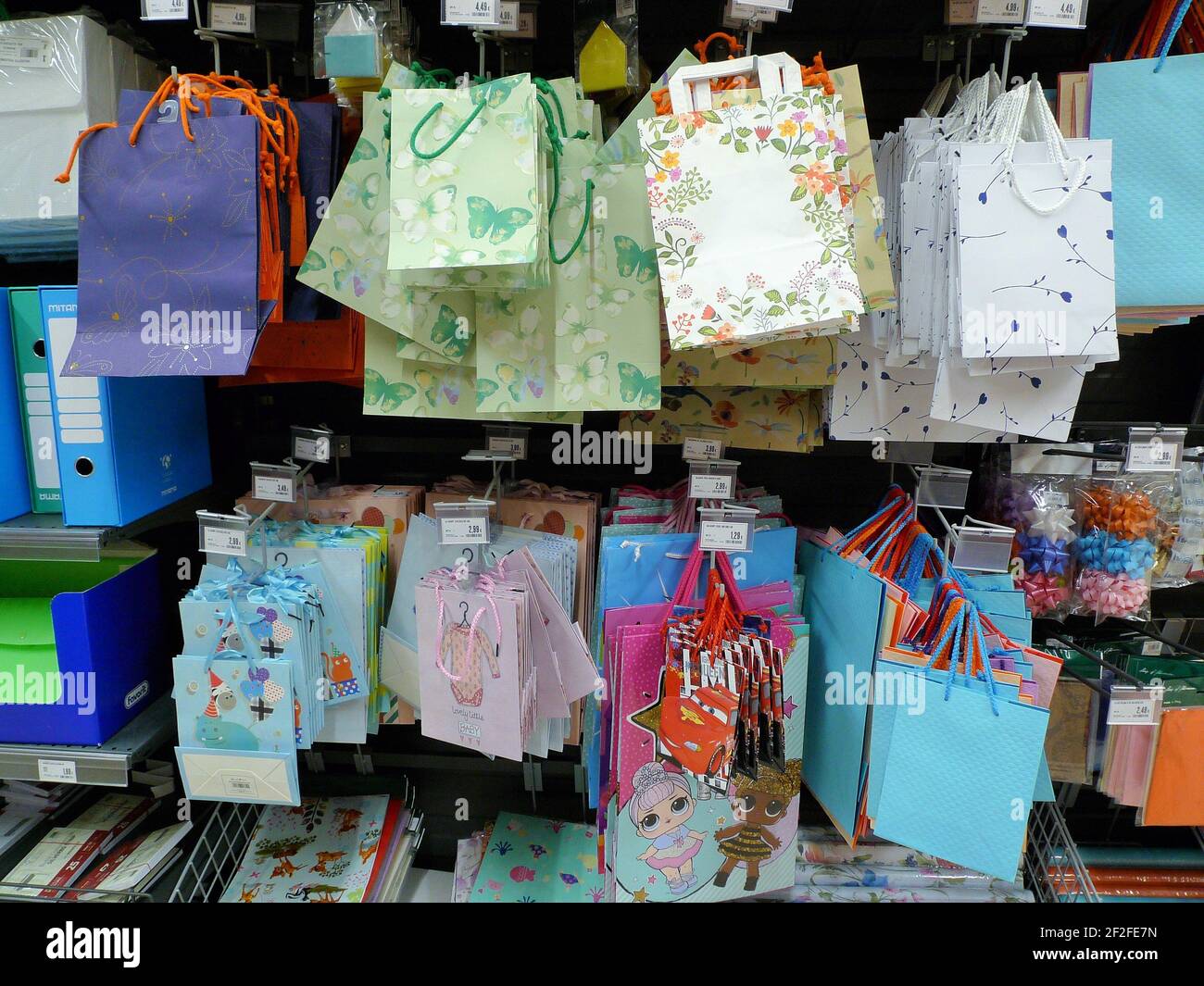 PAPER BAGS DECORATED FOR GIFTS ON A STORE SHELF Stock Photo - Alamy