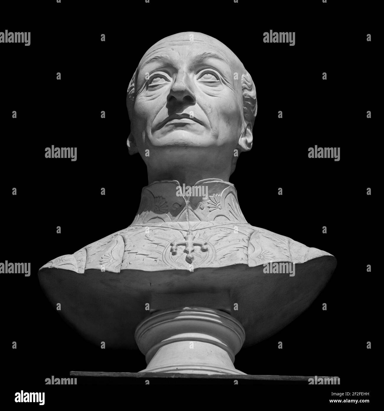 Head detail of the ancient man sculpture. Stone face isolated on black ...