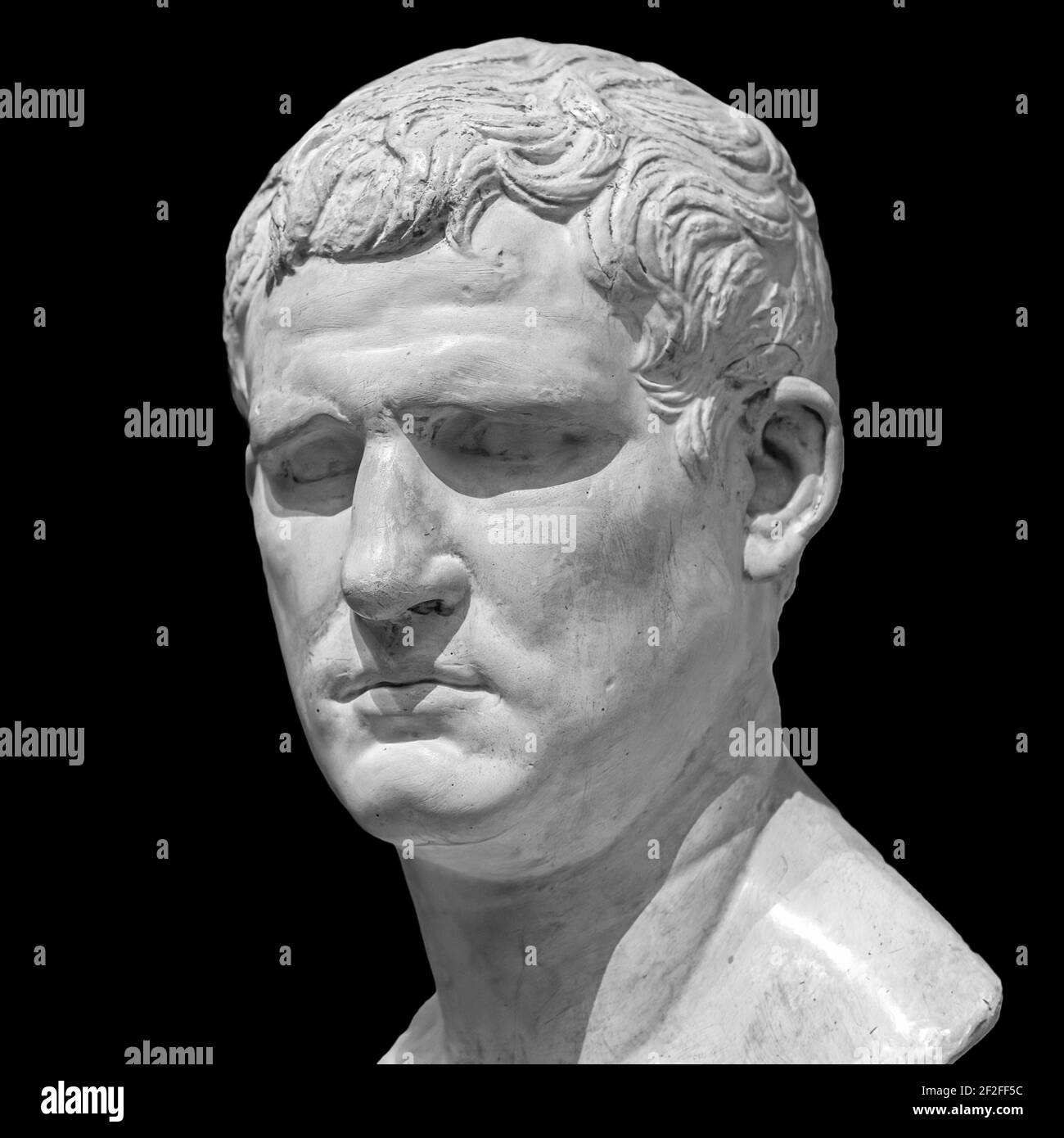 Head detail of the ancient man sculpture. Stone face isolated on black ...