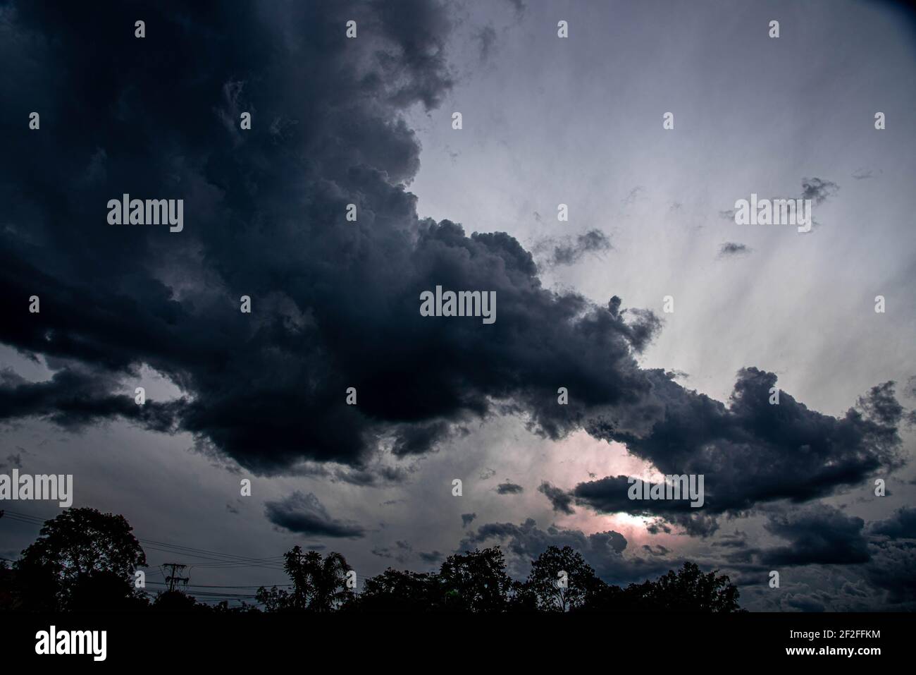 Colorful rain clouds at dusk. Rain-forming clouds. Sunset in the skies ...