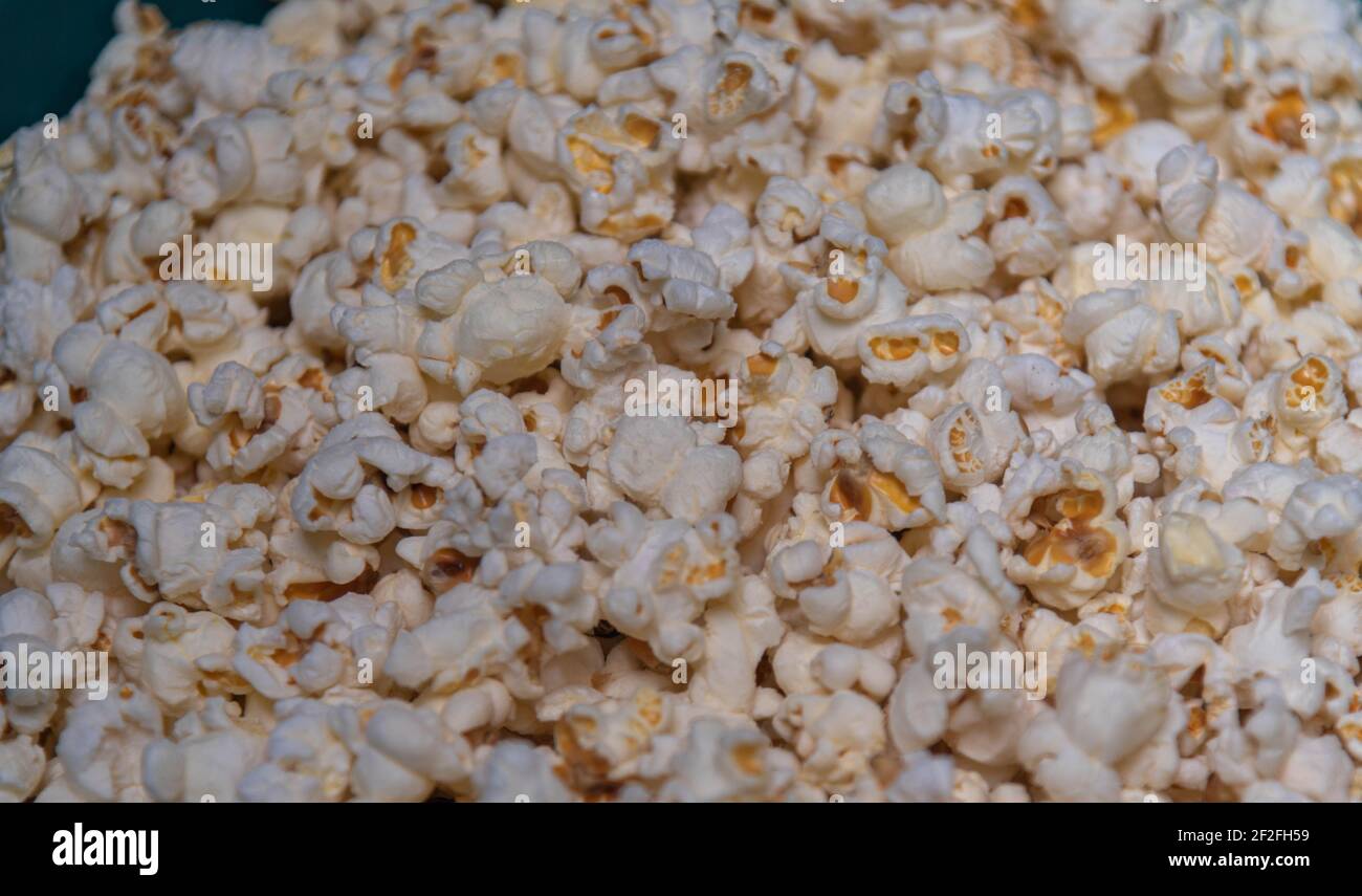 Popped popcorn. Popcorn ready for consumption. human food. Kit for ...