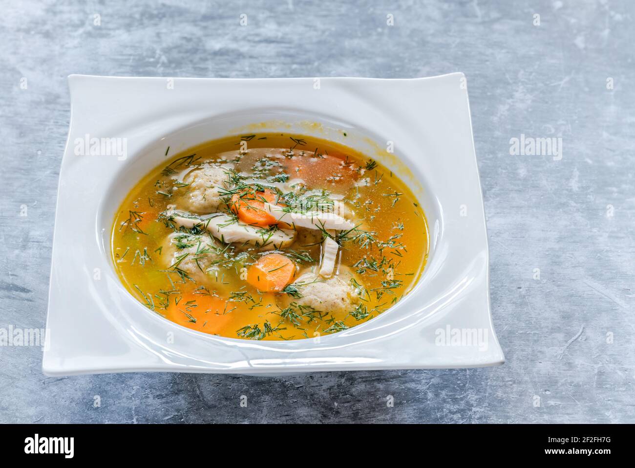 Chicken and matzo ball soup - traditional Ashkenazi Jewish dish for ...
