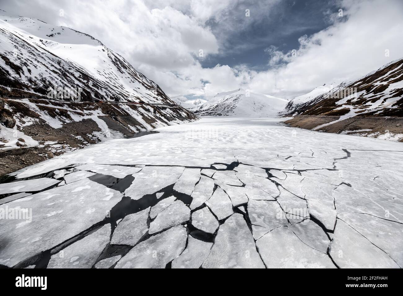 frozen ice floes, dam at the Lukmanier Pass - Switzerland Stock Photo ...