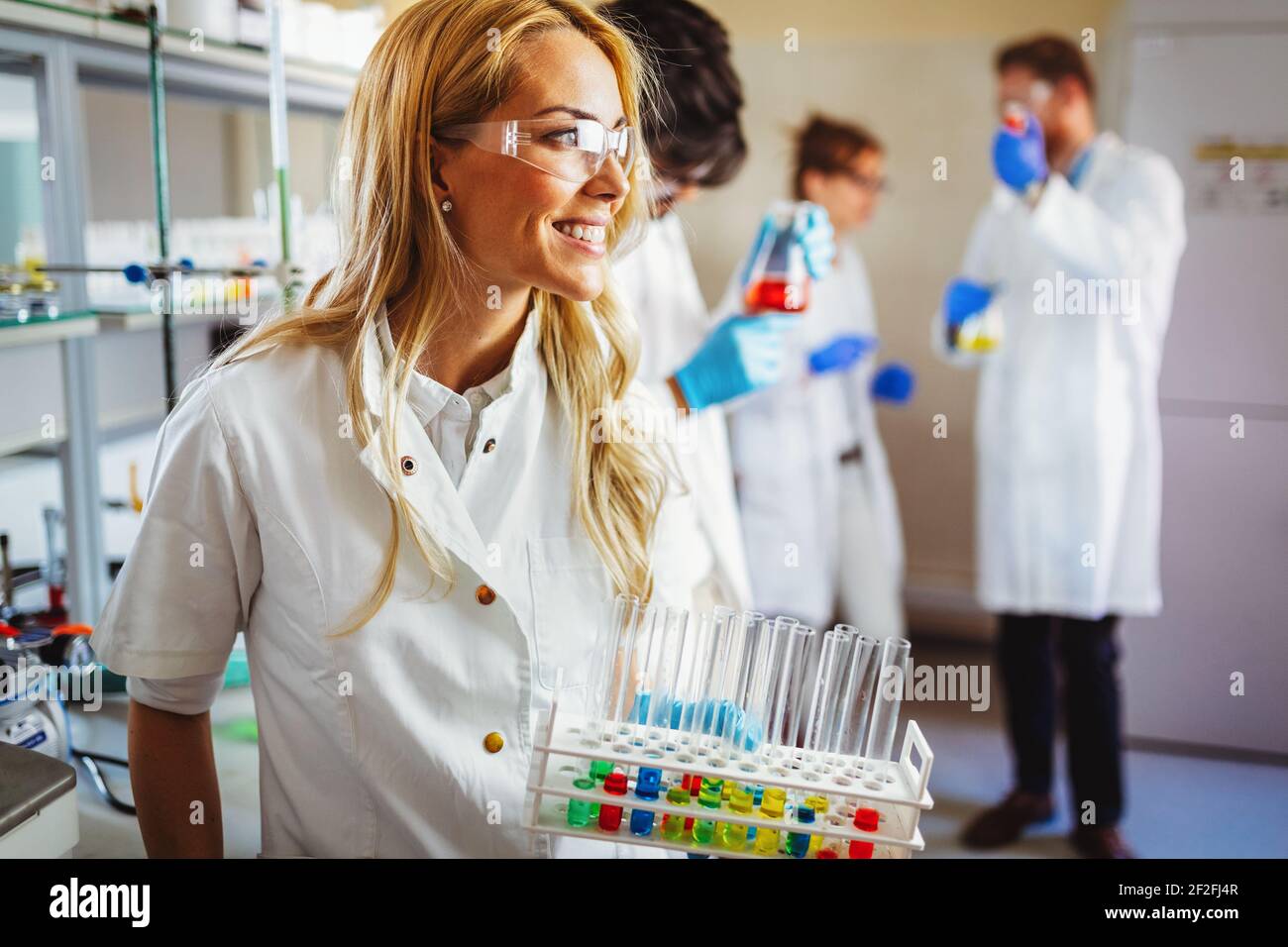 Group of medical scientists working at laboratory. Science, chemistry ...