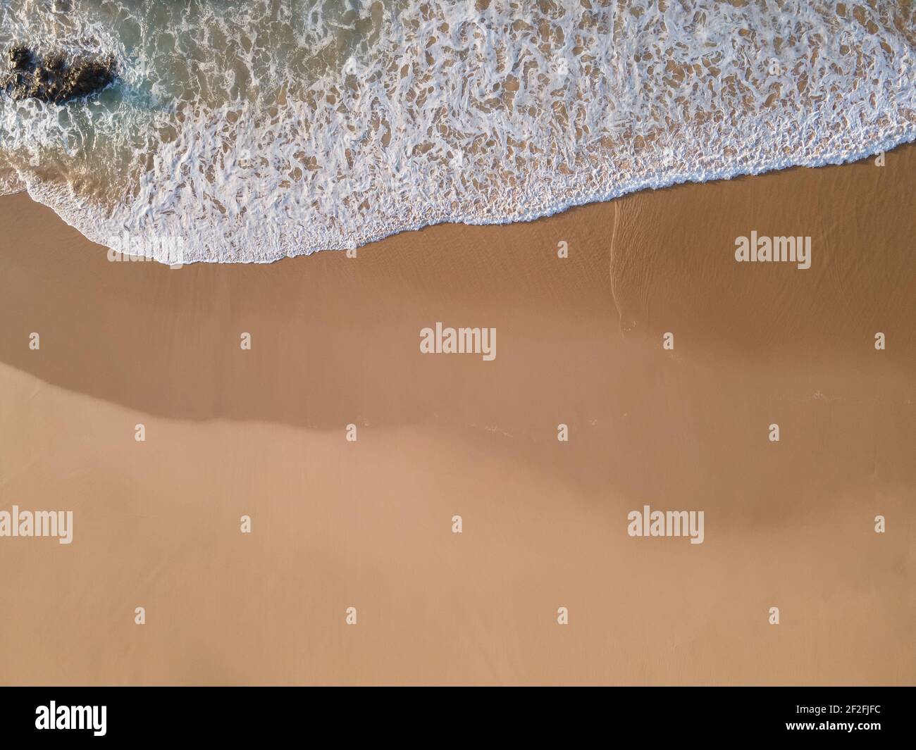 Beach shore wave overhead aerial shot Stock Photo - Alamy
