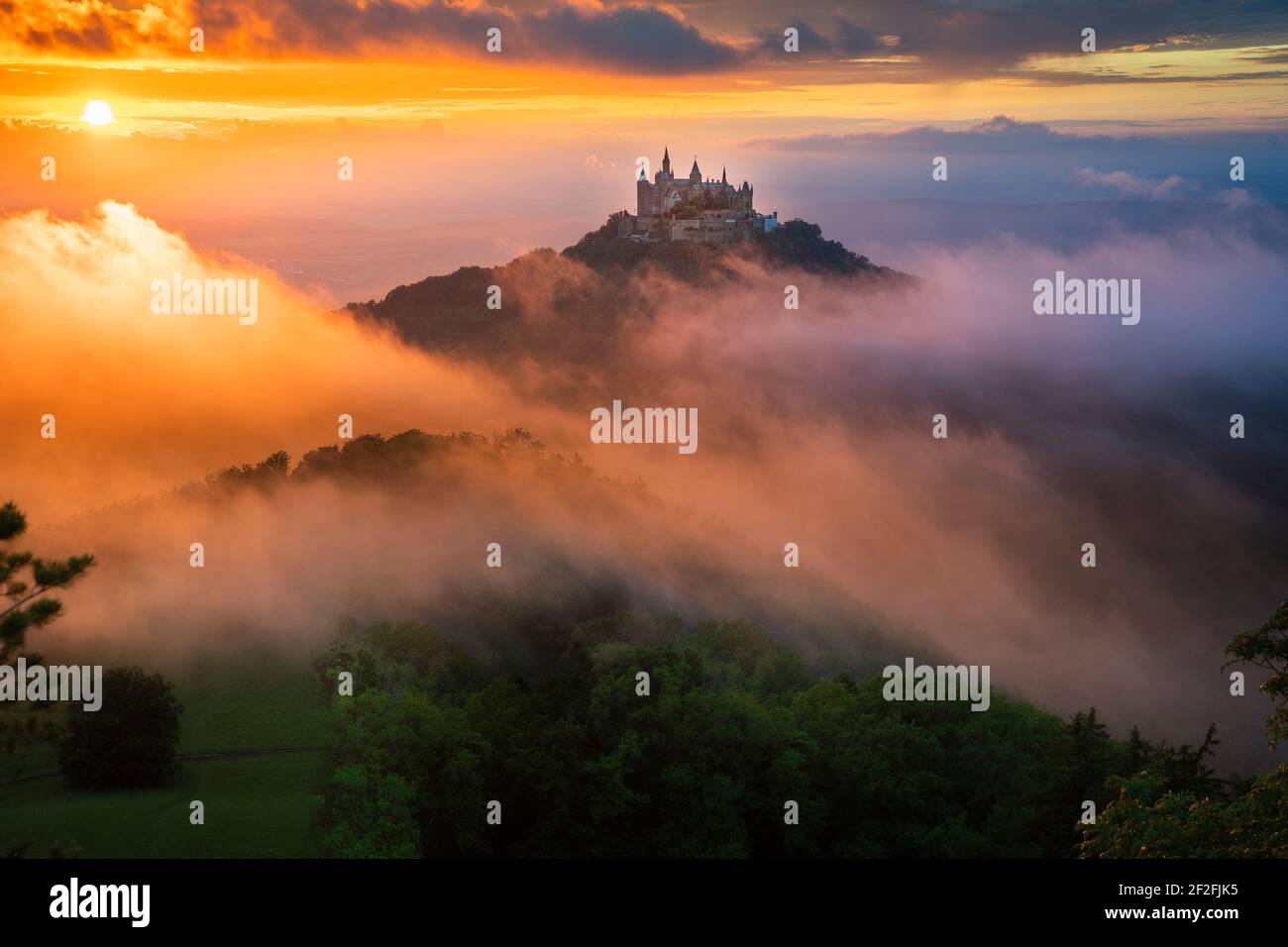 Hohenzollern Castle in the fog at sunset, Germany Stock Photo - Alamy