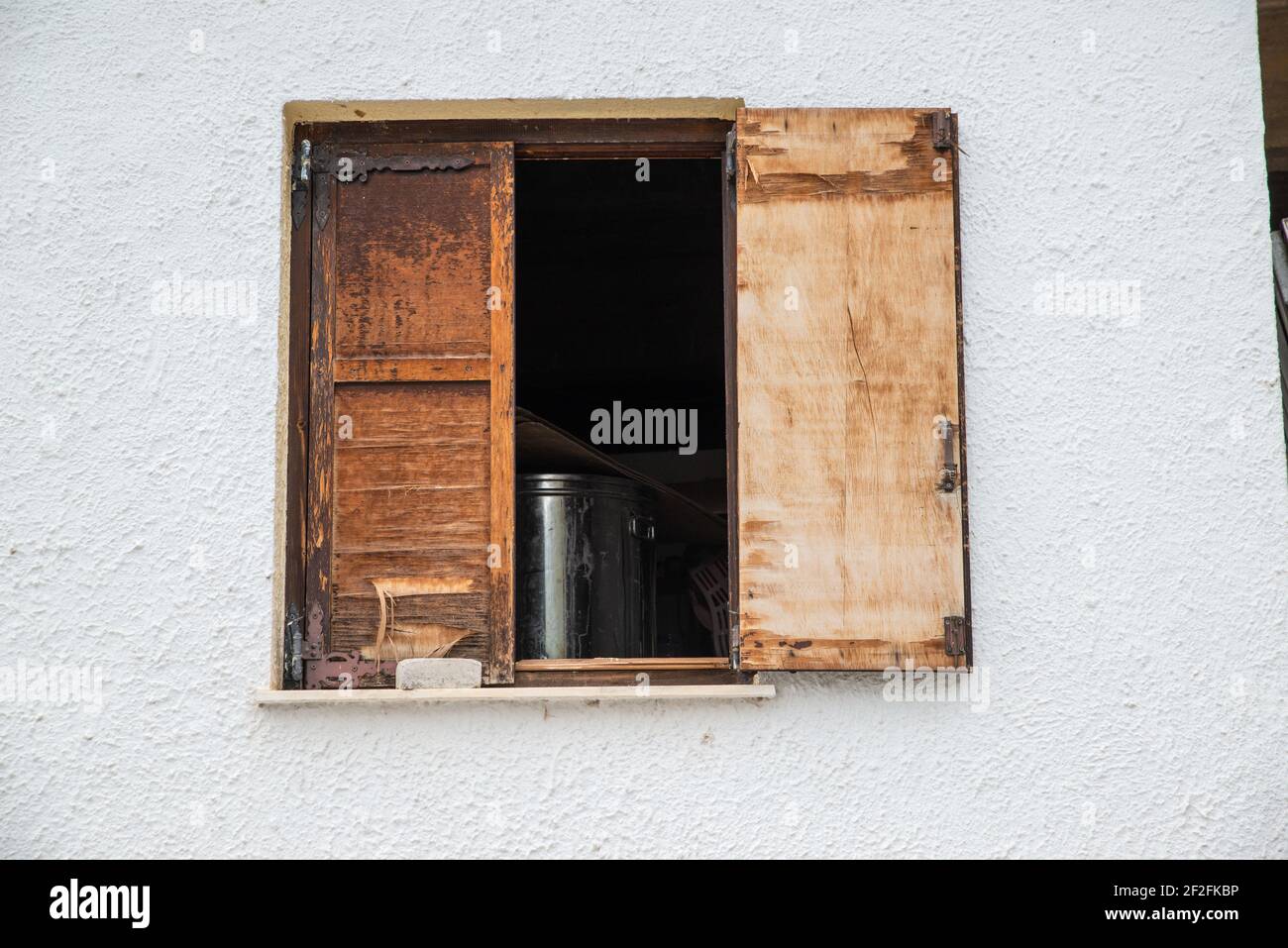 Window with partly open wooden shutters Stock Photo - Alamy