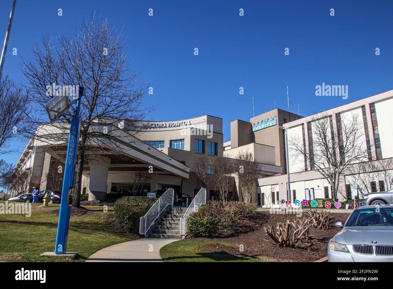 Augusta, Ga USA - 02 03 21: Doctors Hospital entrance with people cars ...