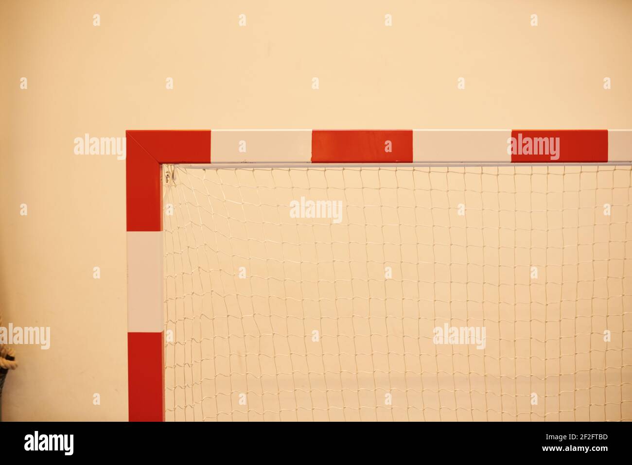 Red and white soccer goal at a school Stock Photo - Alamy