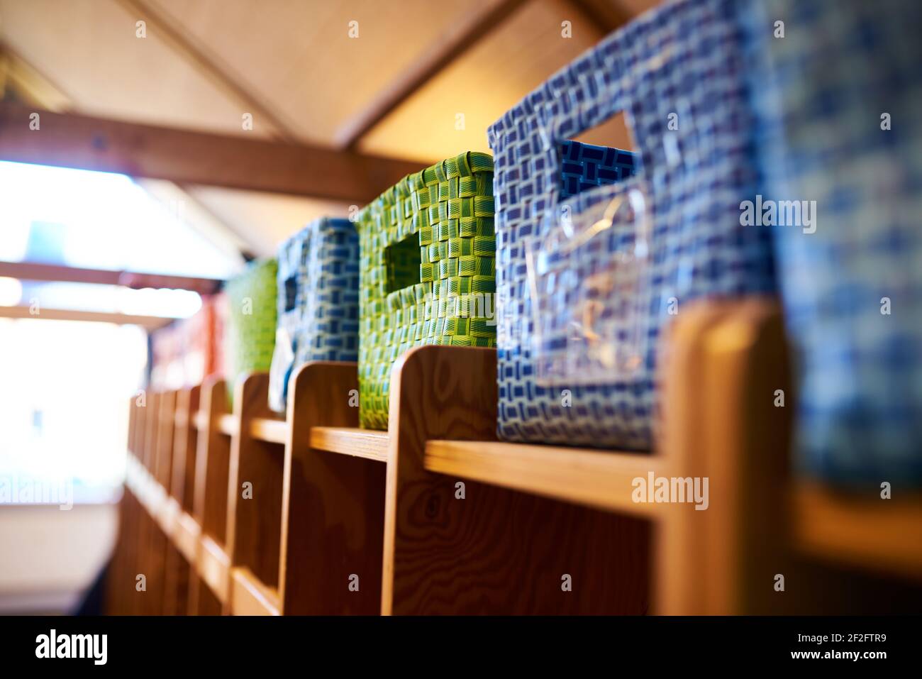 baskets for kids at a wardrobe at a school Stock Photo - Alamy