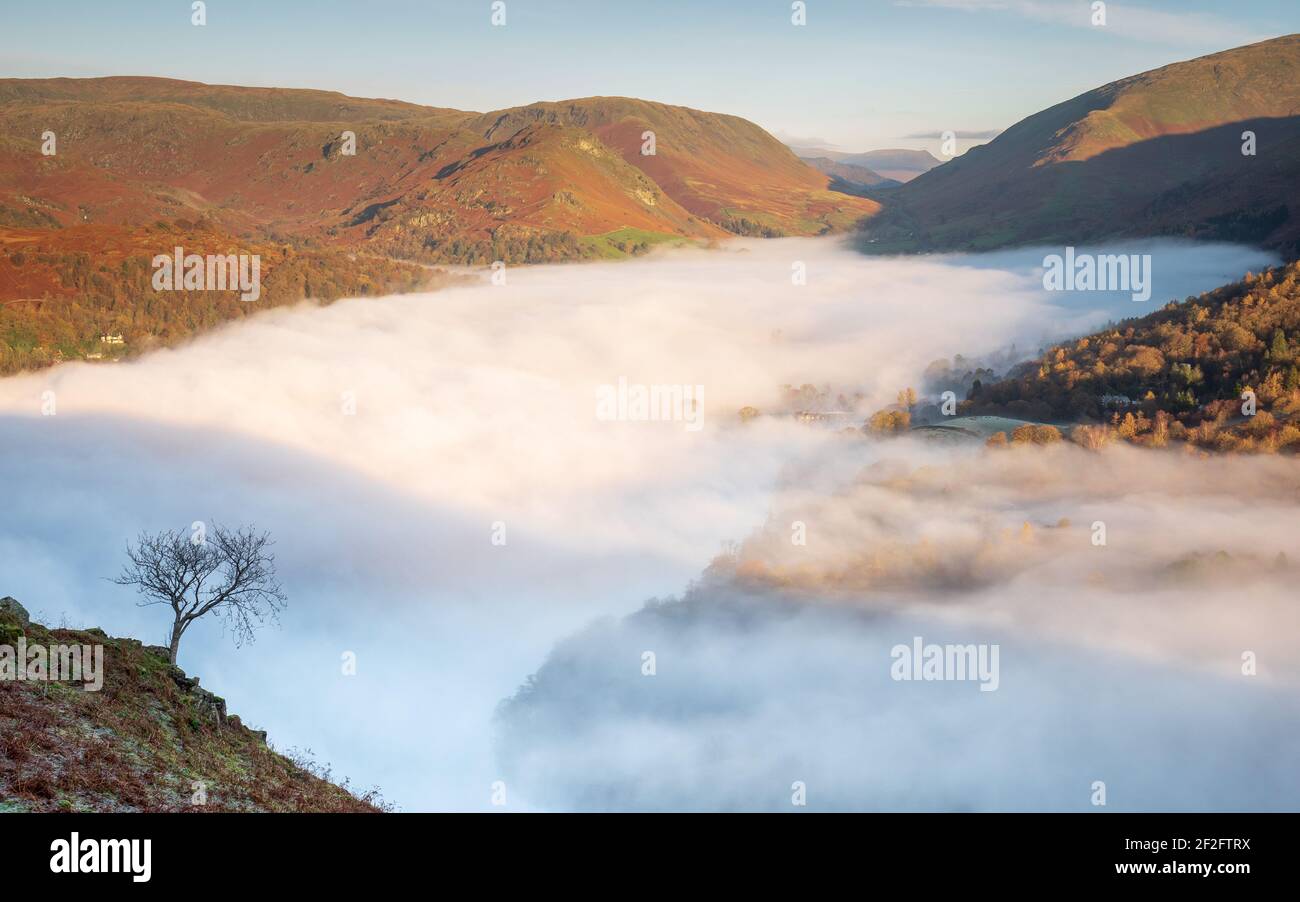 The view from Loughrigg Fell overlooking Grasmere on a chilly autumn ...