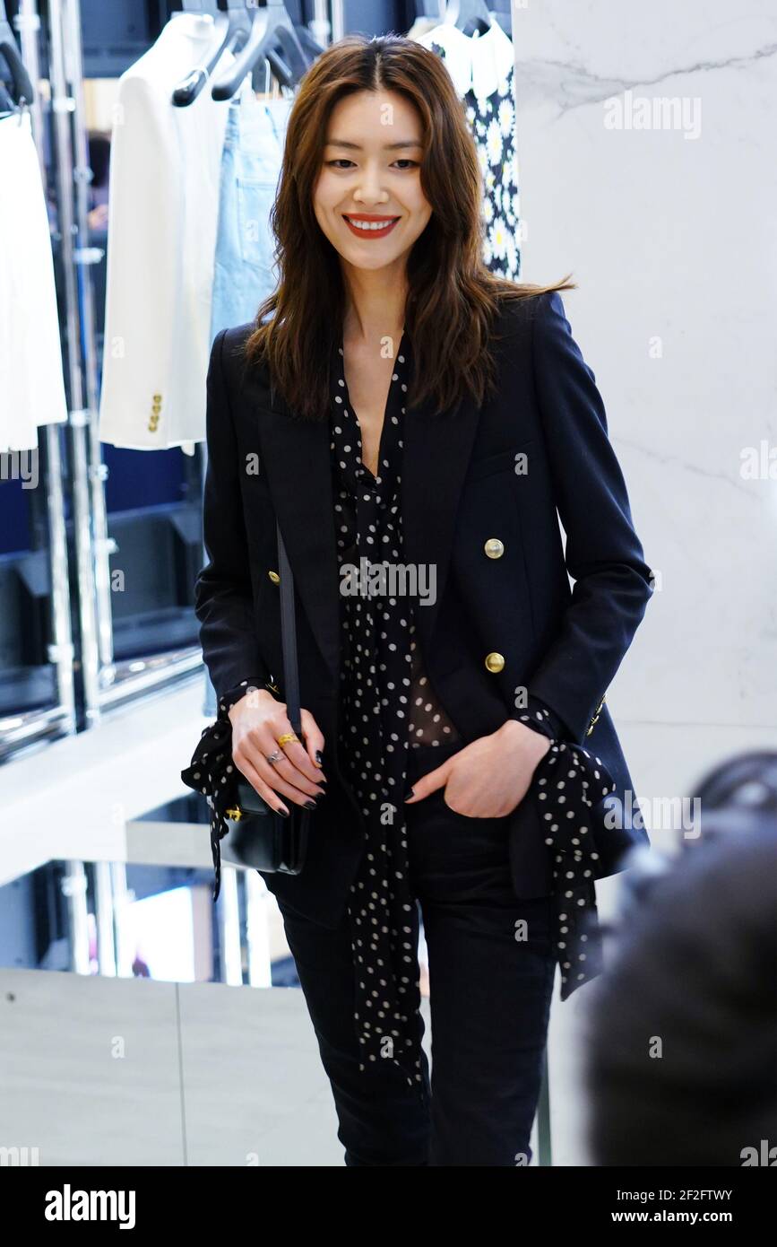 Chinese model Liu Wen stands for a promotional event of luxury brand ...