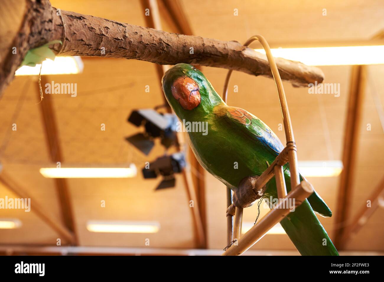 closeup of a plastic parrot in a tree as decoration Stock Photo - Alamy