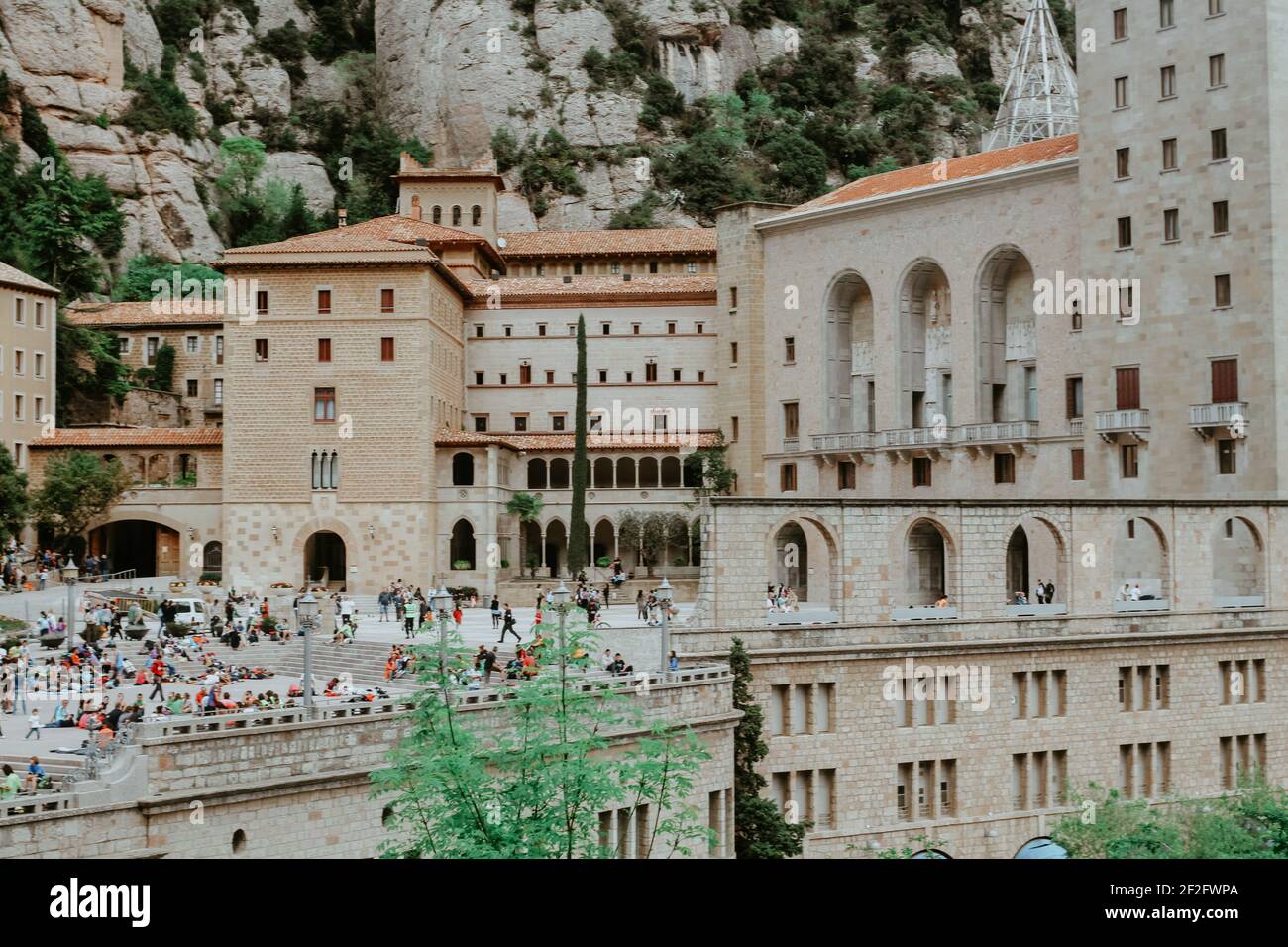 The Abbey of Montserrat full of tourists Stock Photo - Alamy
