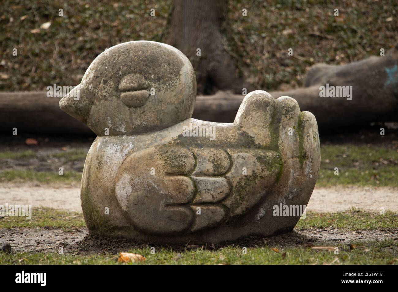 A stone duck sculpture in a park Stock Photo - Alamy