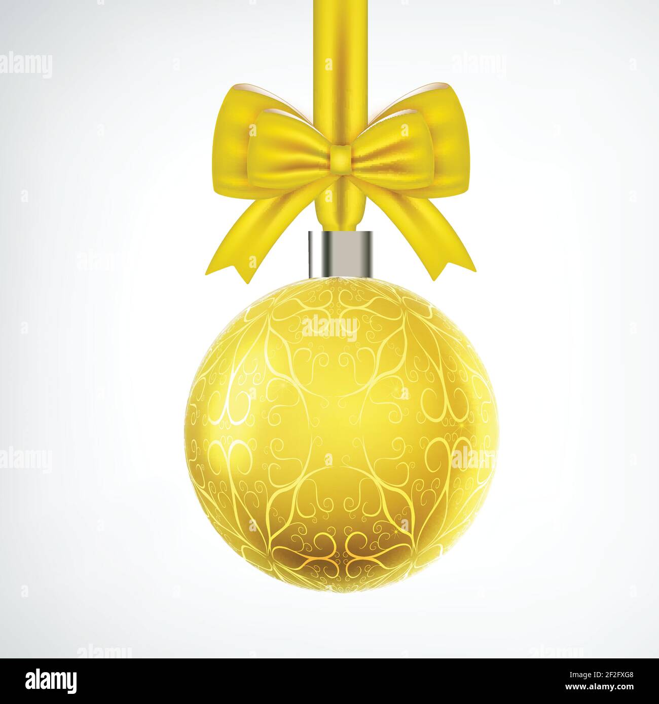 Bright yellow patterned christmas bauble with ribbon bow on white ...