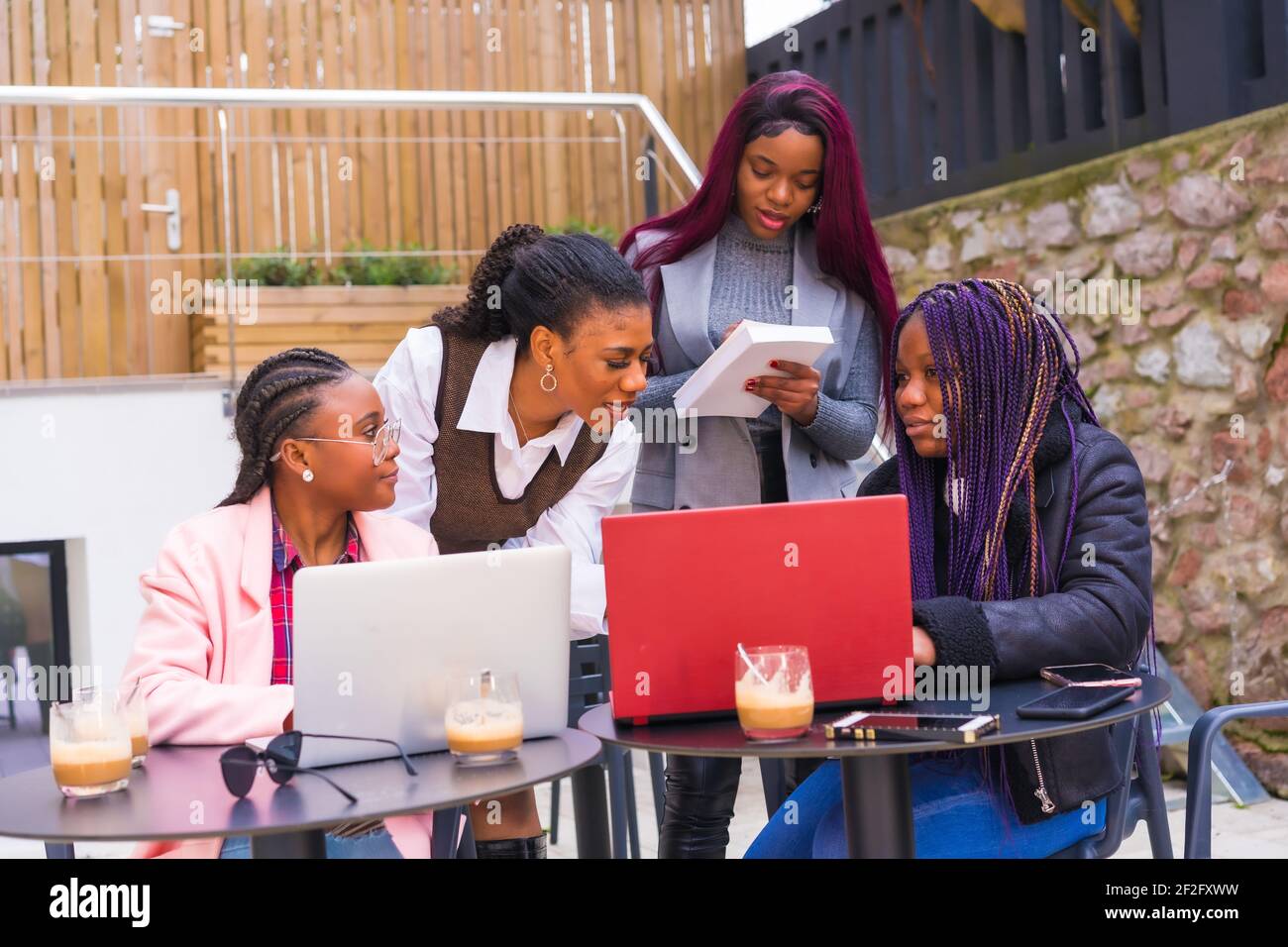 A group of African American businesswomen during a teamwork Stock Photo ...
