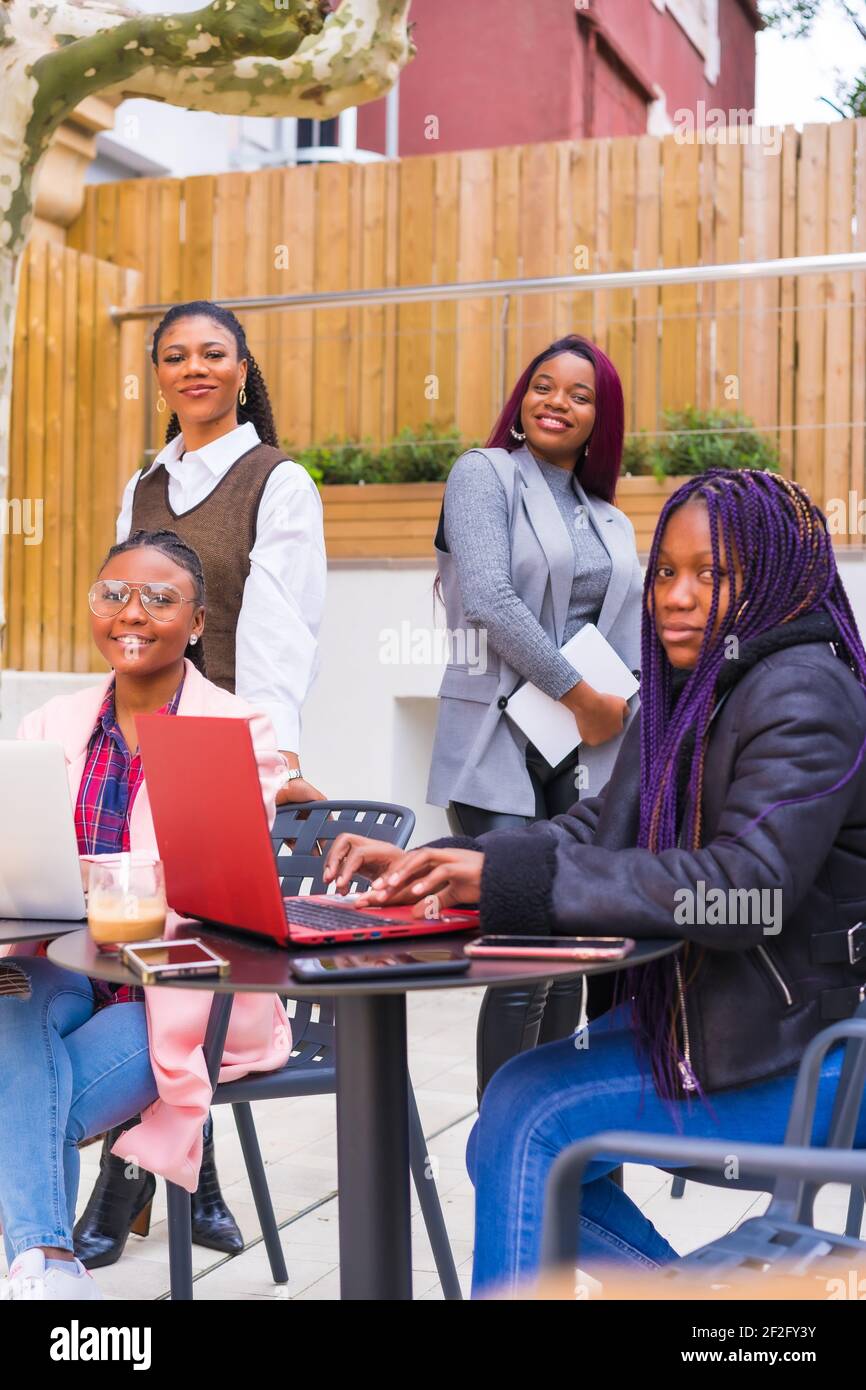 A group of African American businesswomen during a teamwork Stock Photo ...