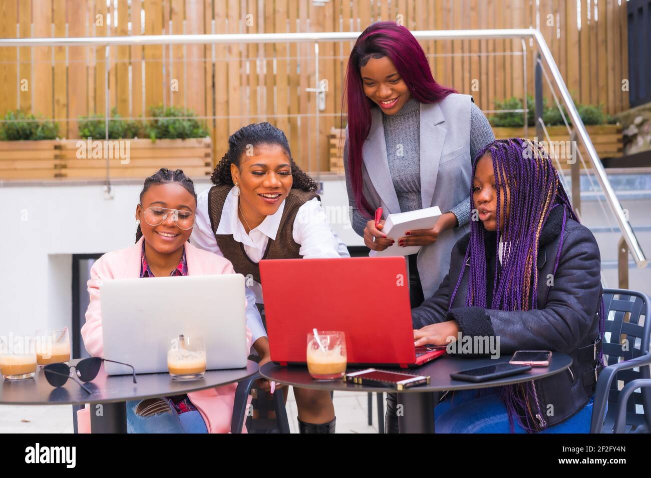 A group of African American businesswomen during a teamwork Stock Photo ...