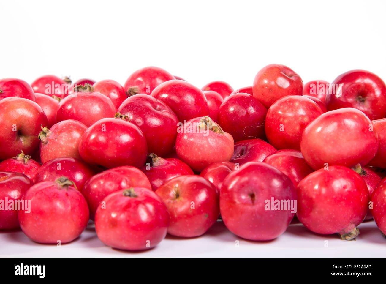 Still-life with fresh small red apples, on white background Stock Photo ...