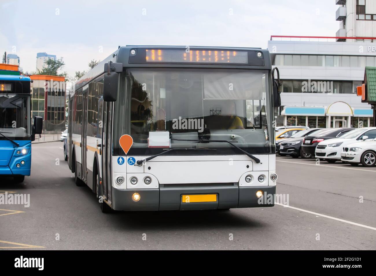 Big city buses in the Parking lot in the city Stock Photo - Alamy