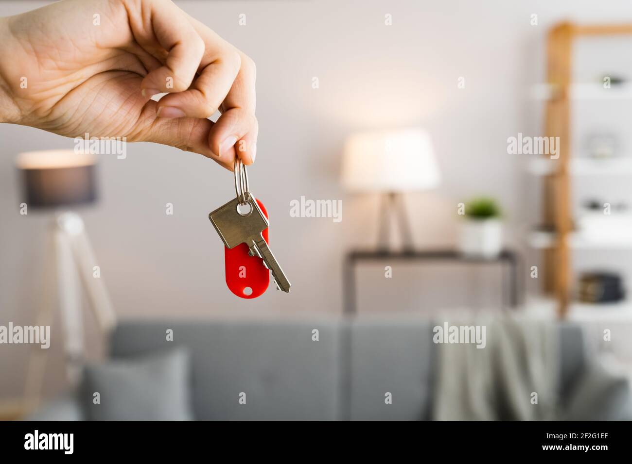 Holding key keys hi-res stock photography and images - Alamy