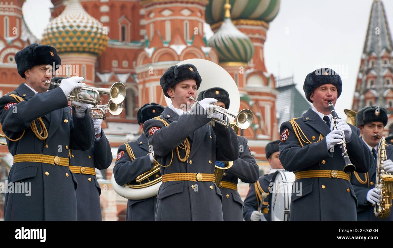 Military musicians with wind instruments perform with the Intercession ...