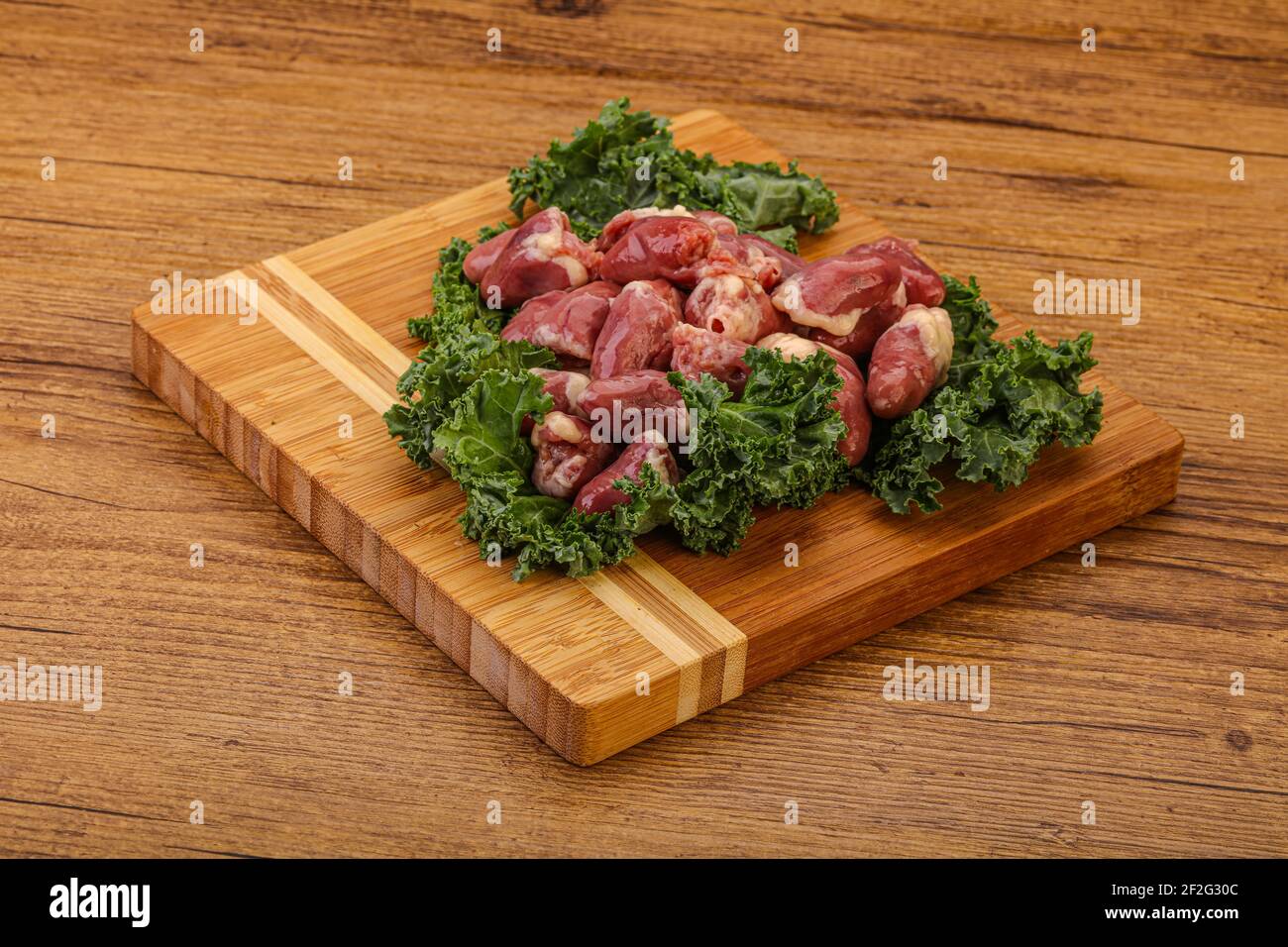 Raw chicken hearts heap for cooking Stock Photo - Alamy