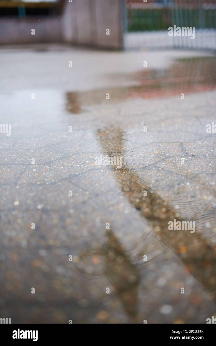 Closeup puddle on playground hi-res stock photography and images - Alamy