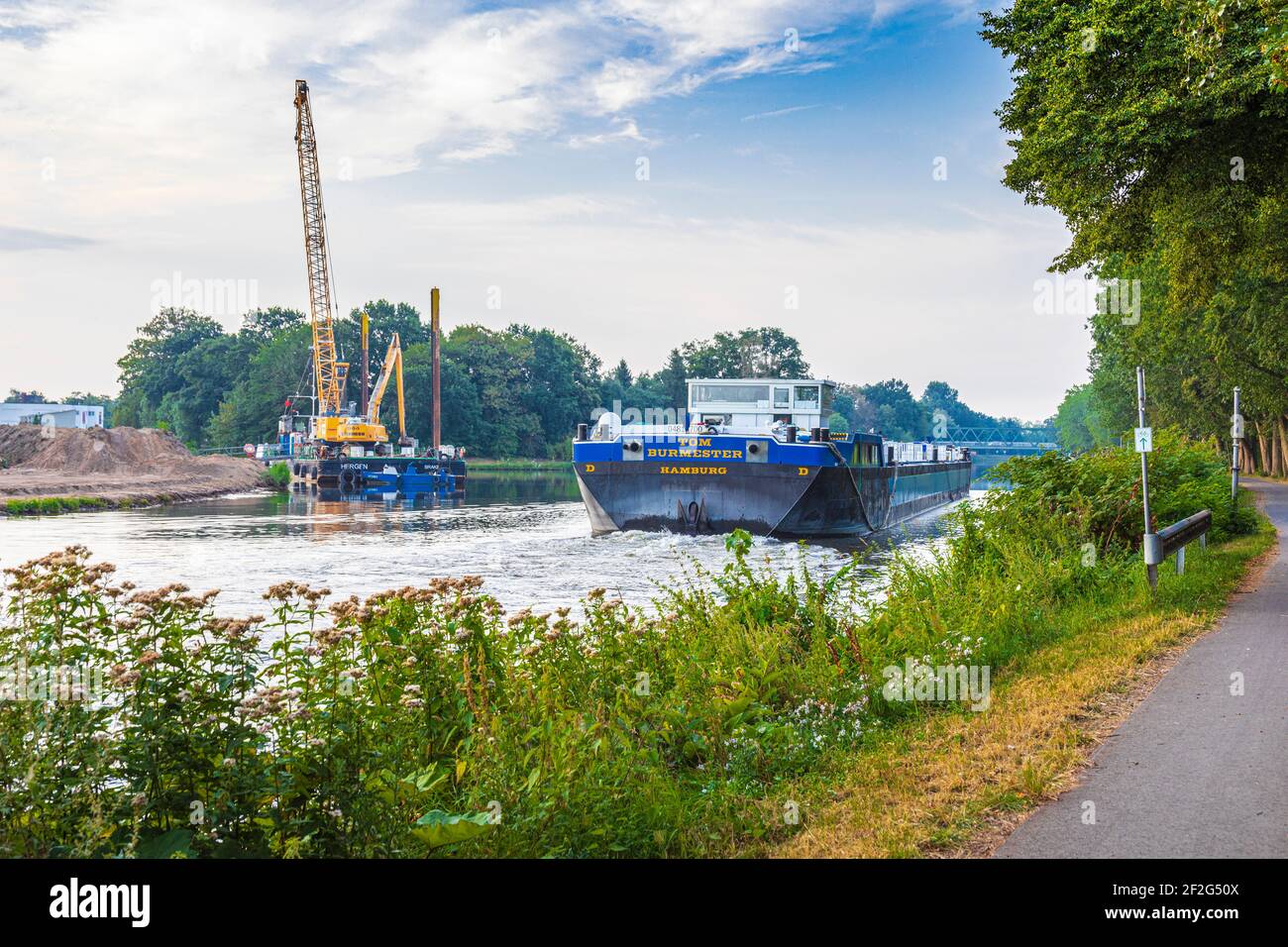 Inland shipping, supply ship Stock Photo - Alamy