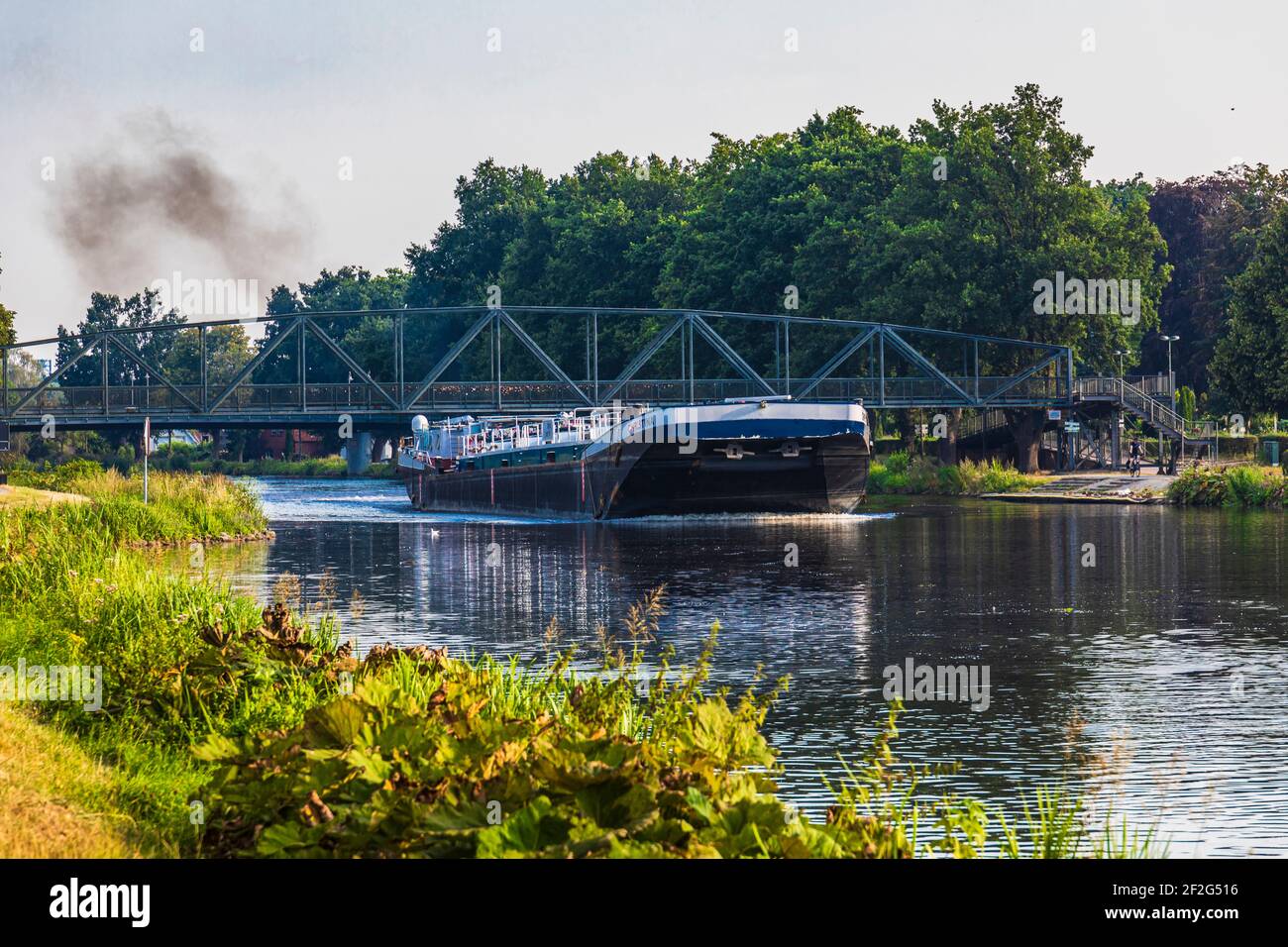 Inland shipping, supply ship Stock Photo - Alamy