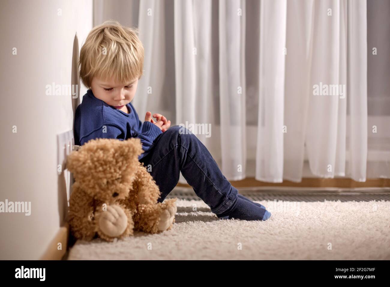 Sitting in corner as punishment hi-res stock photography and images - Alamy