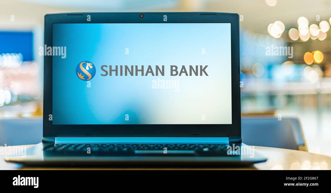 POZNAN, POL - FEB 6, 2021: Laptop computer displaying logo of Shinhan ...