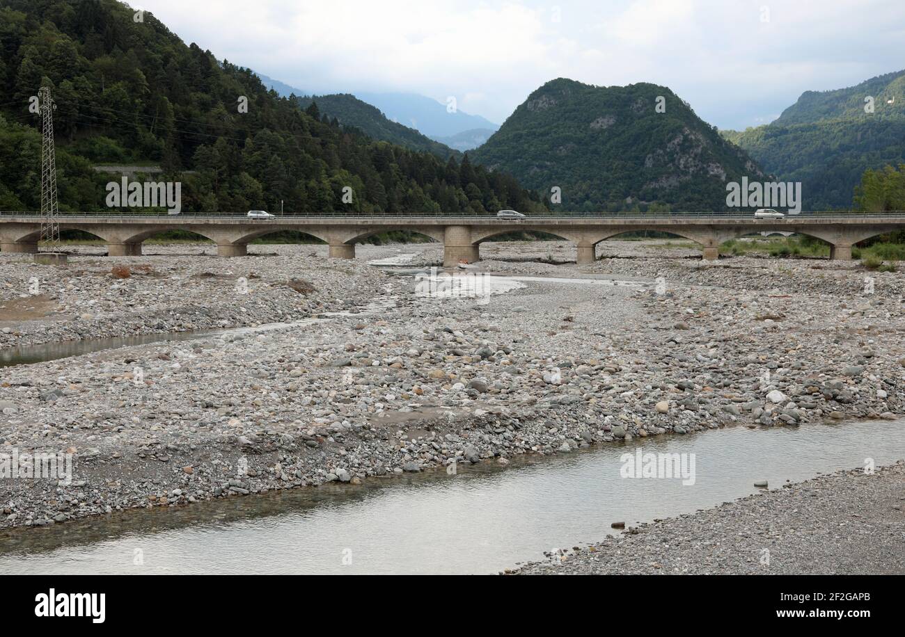 Wide river and a very long bridge Stock Photo - Alamy