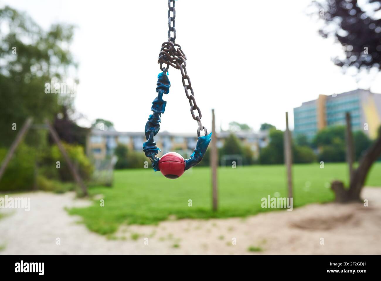 Closeup of a small cable swing at a park playground for children Stock ...